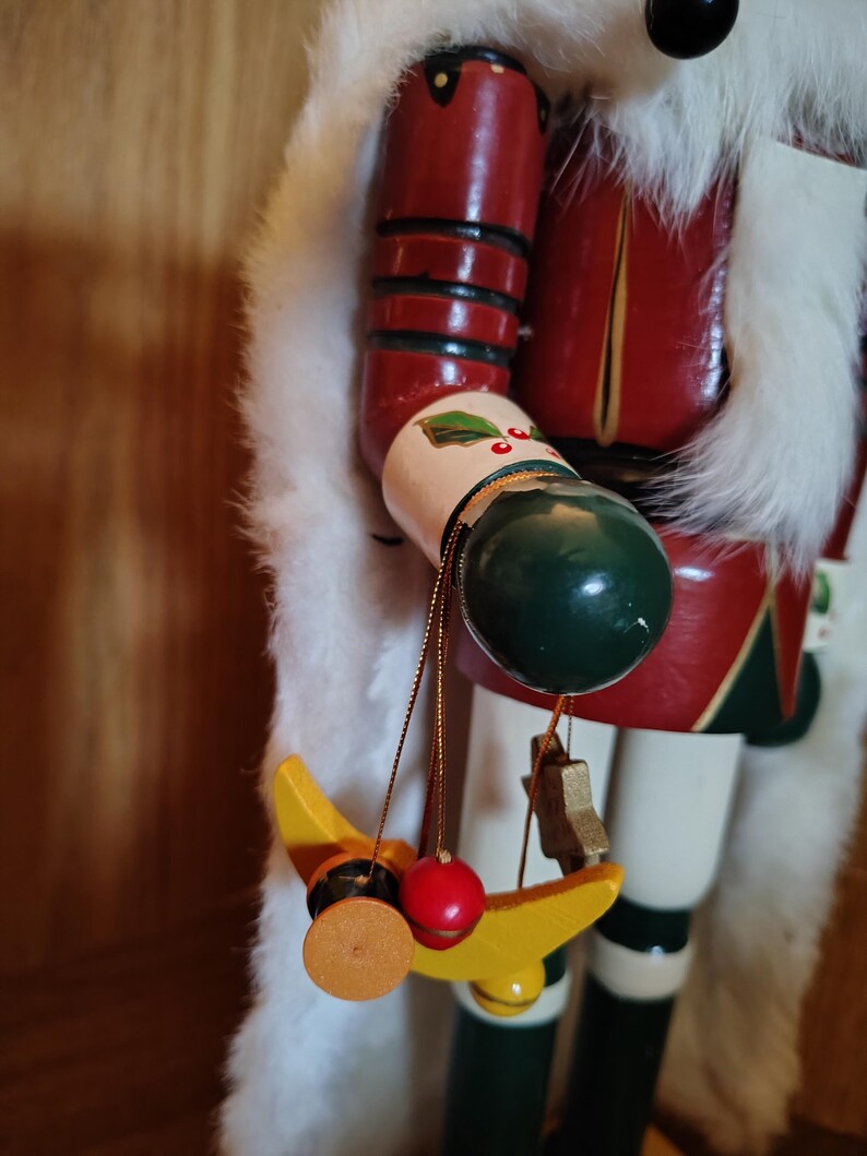Nutcracker Red With White Faux Fur Cape Noon Ball Stars Hanging From ...