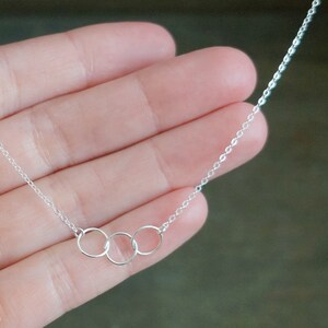 Entwined Circle Necklace / Three Tiny Silver Linked Infinity Rings on a ...