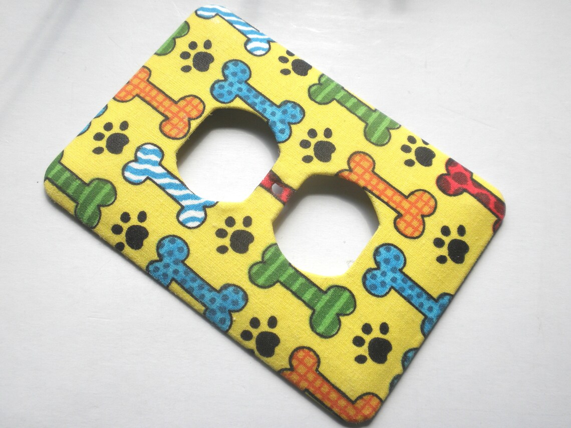 Dog Bones and Paw Prints on Yellow Background Outlet Cover - Etsy