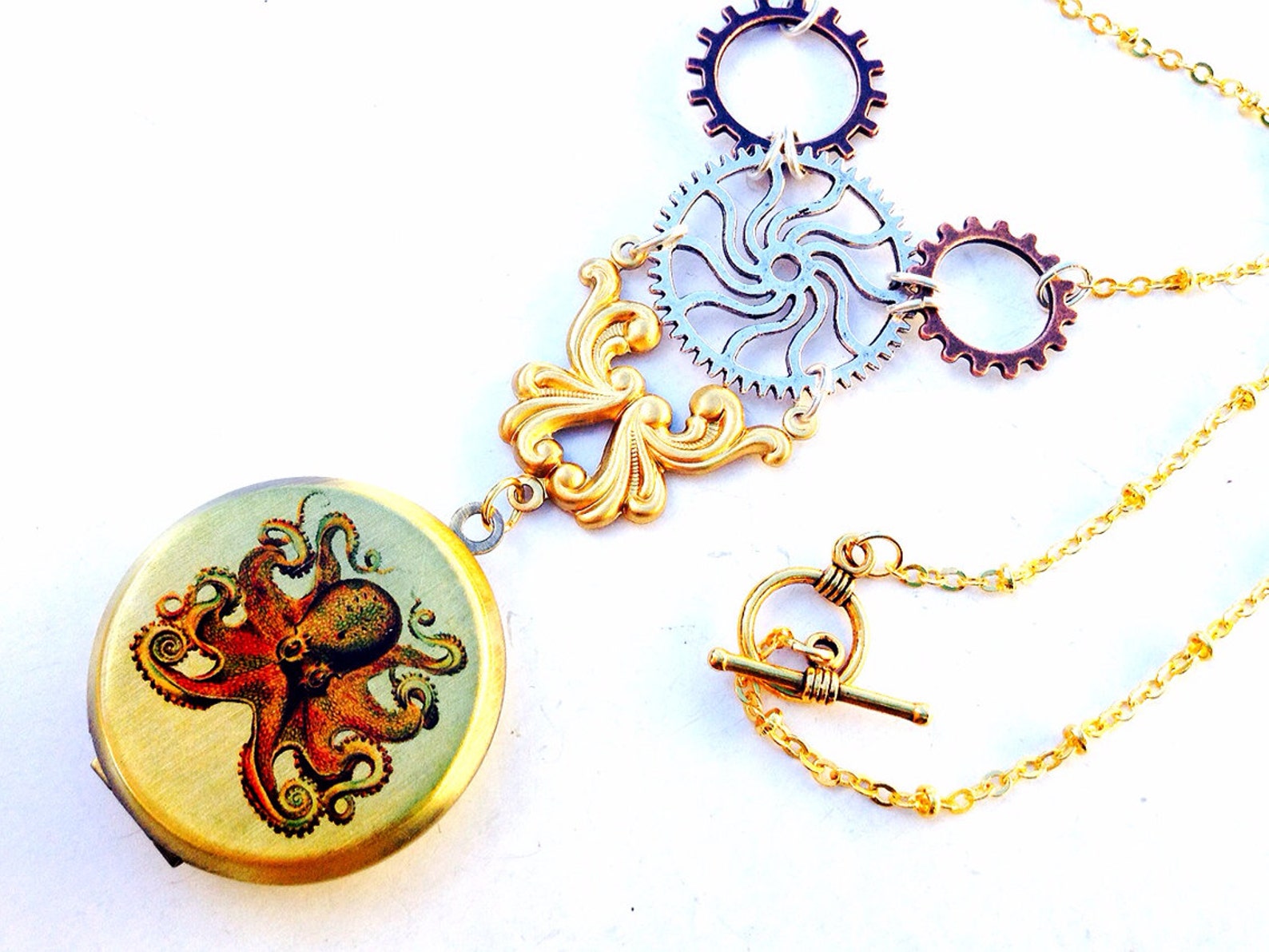 The Creature Running the Machines Octopus Locket With Gears on 18 3/4 ...
