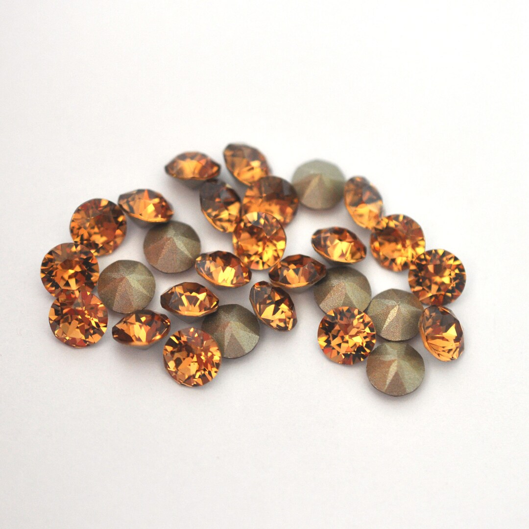 Topacio ahumado claro 29ss 1088 Chatons 6 mm Cristal Barton Múltiples ...