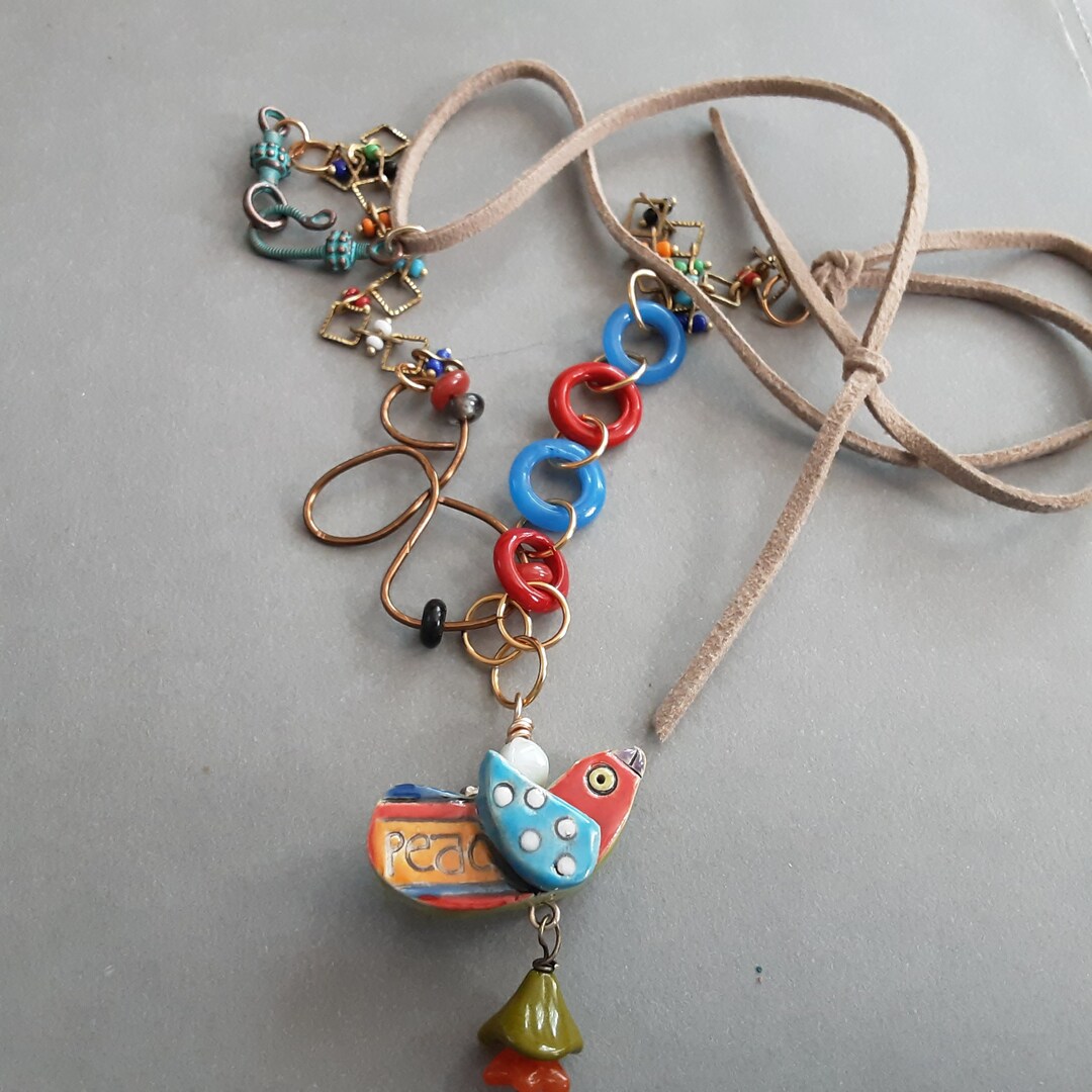 Handcrafted Ceramic Reversible Bird With African Glass Rings in Blue ...