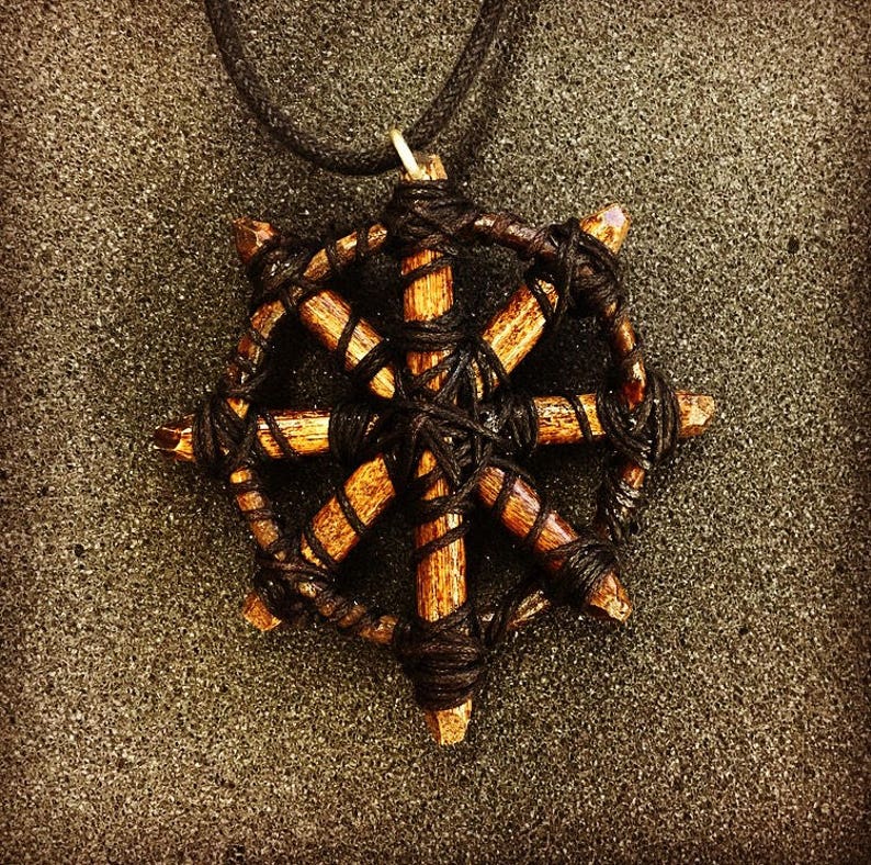 Wheel of pain pendant based on pendant from Conan the | Etsy