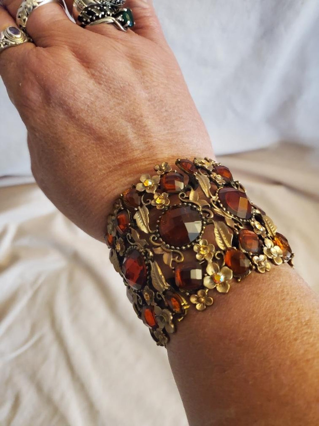Gold and Brown Beaded Gold Toned Wide Spring-loaded Bracelet With ...