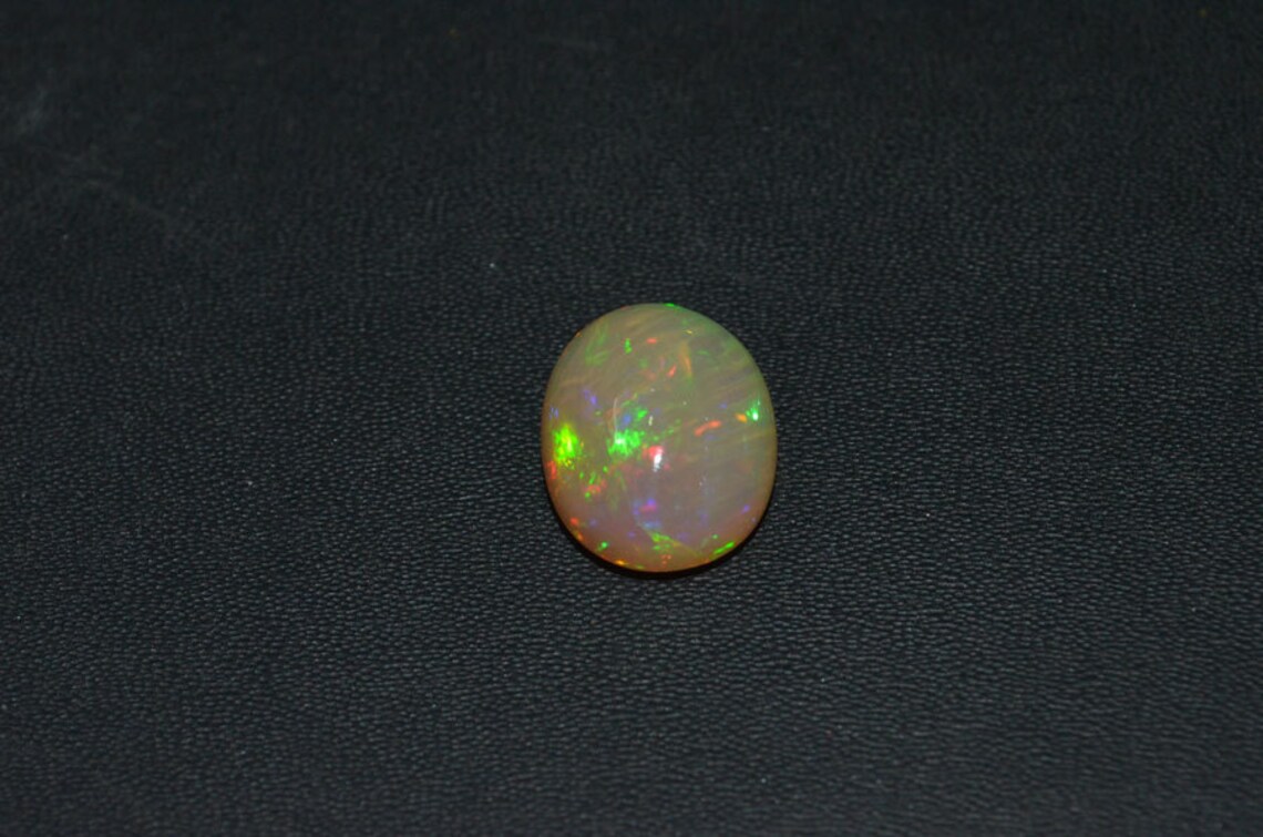 11.3ct. ethiopian opal oval cab 14 x 18 code: 29 | Etsy