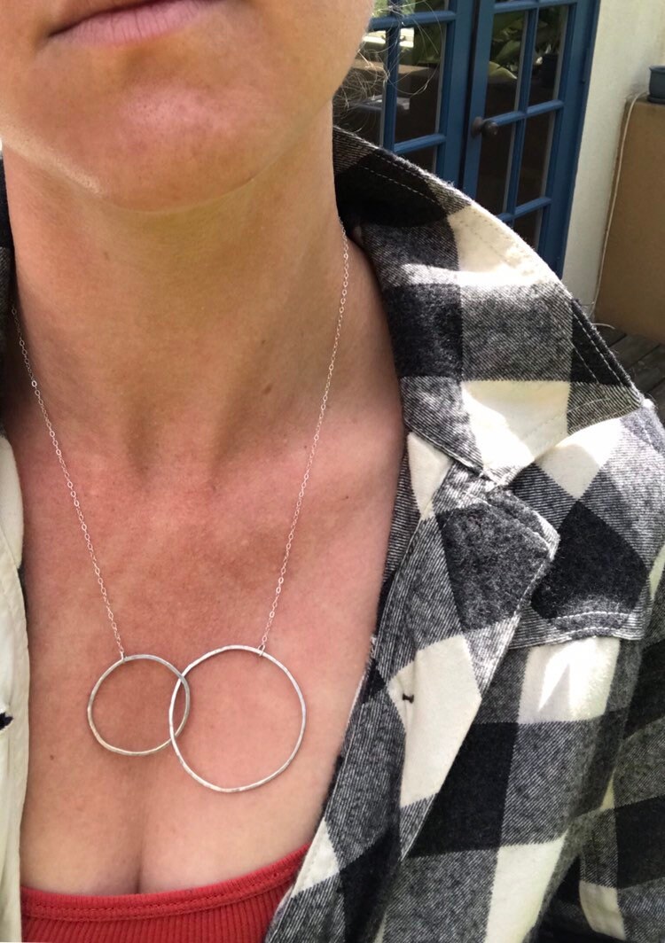 The Lydia necklace is made of two sterling silver interlocking circles ...