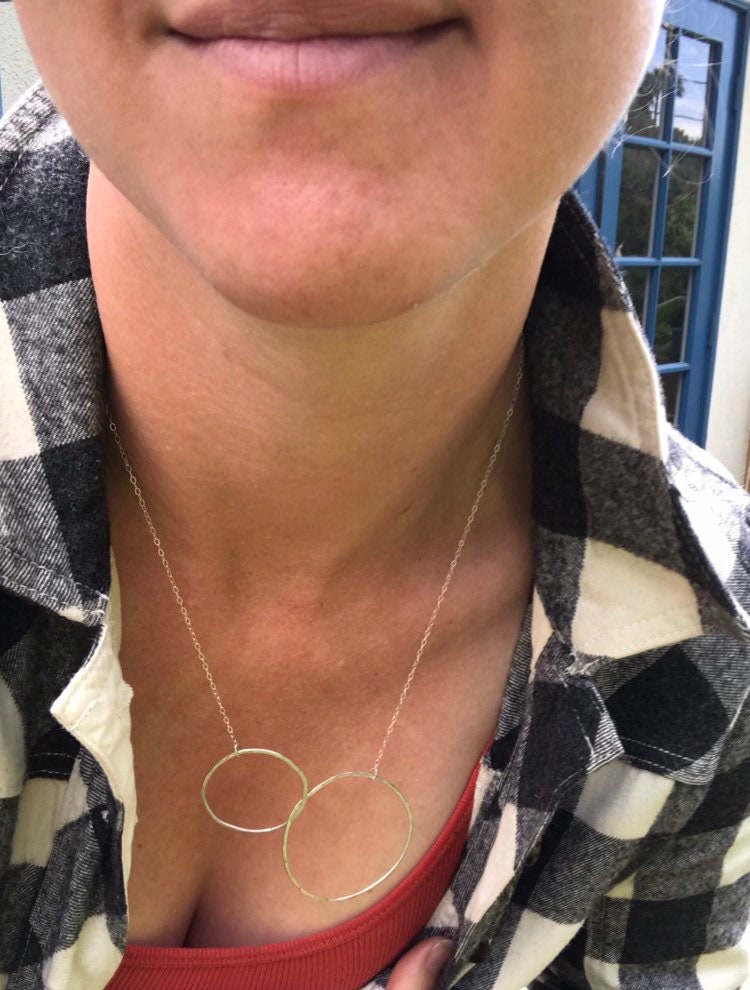 The Lydia necklace is made of two sterling silver interlocking circles ...