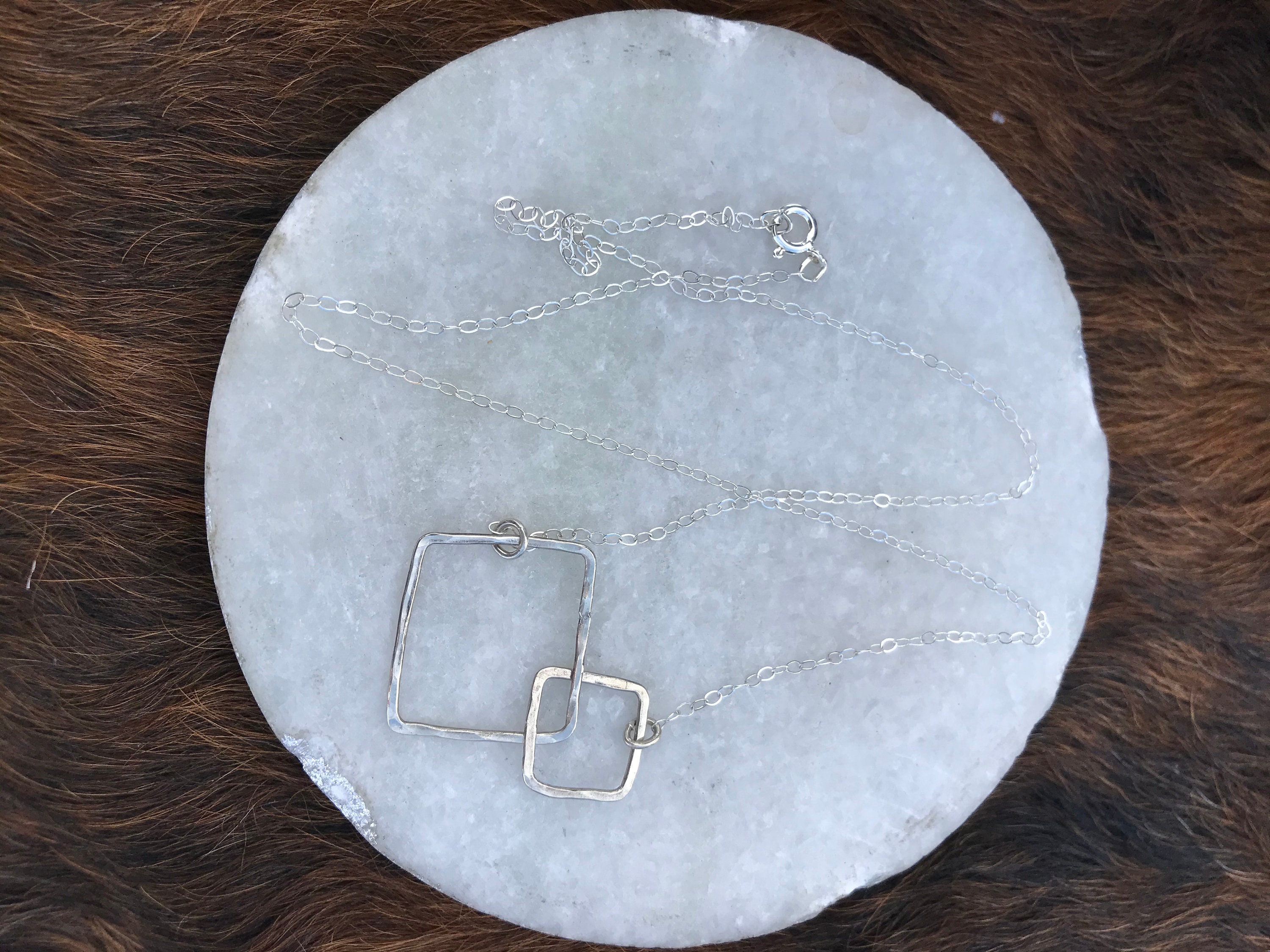 The 18” long Lydia necklace is made of two sterling silver interlocking ...