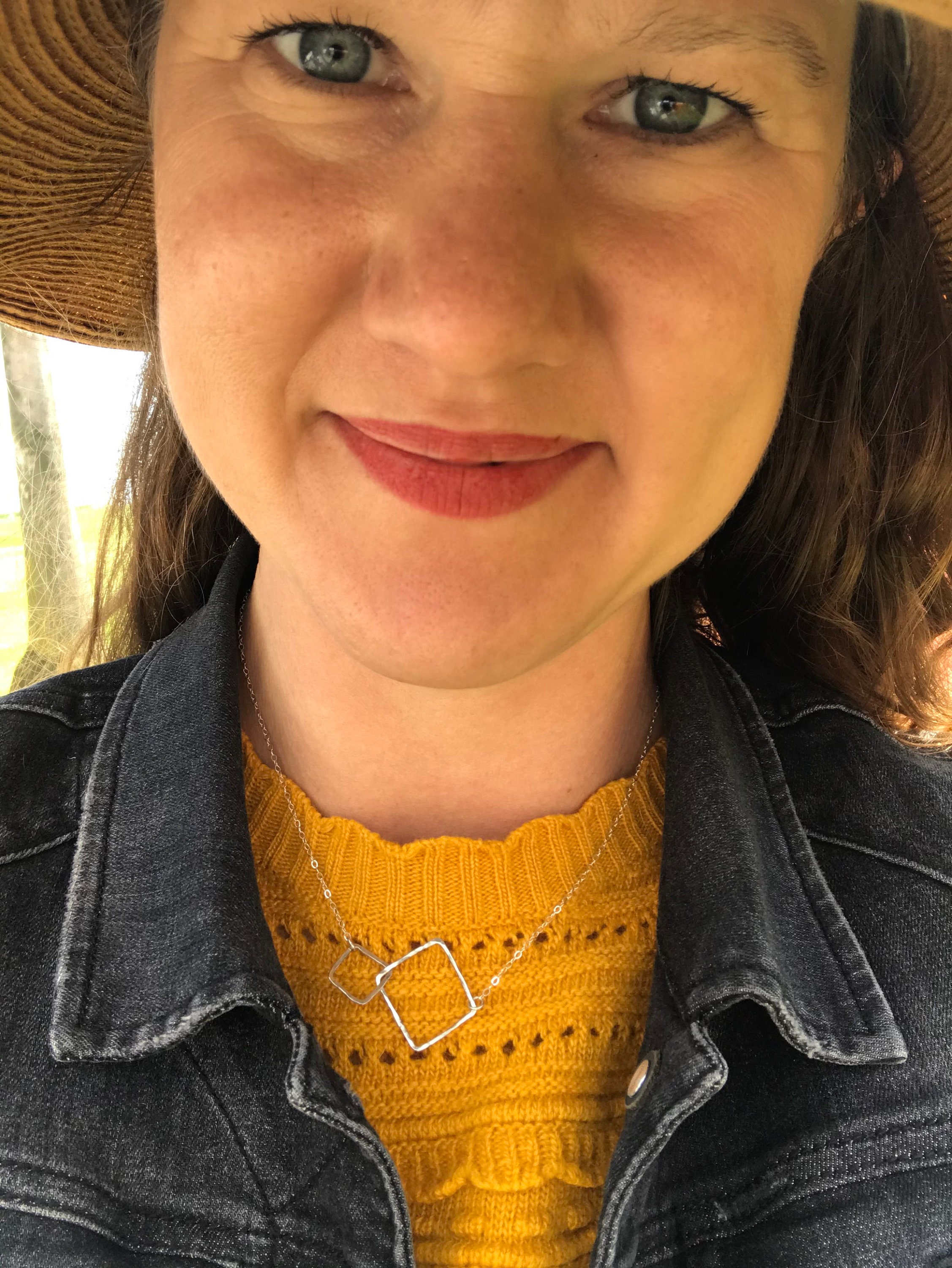 The 18” long Lydia necklace is made of two sterling silver interlocking ...