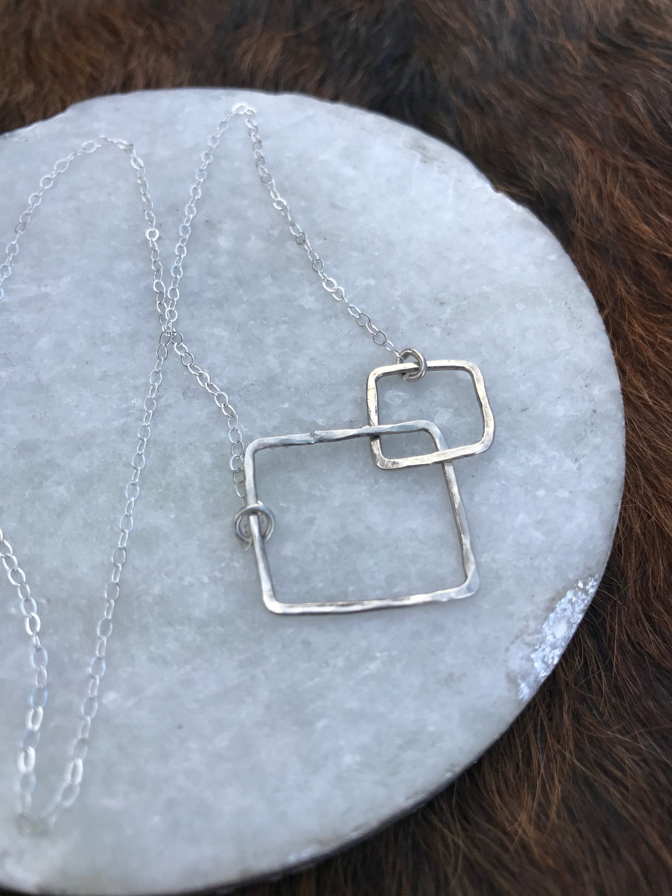 The 18” long Lydia necklace is made of two sterling silver interlocking ...