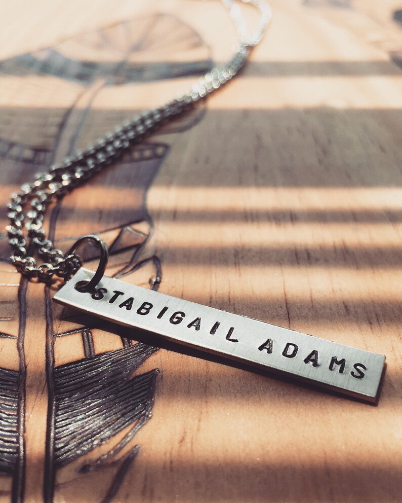 Story Teller Necklace With Handstamped Bars and a Wing Charm - Etsy