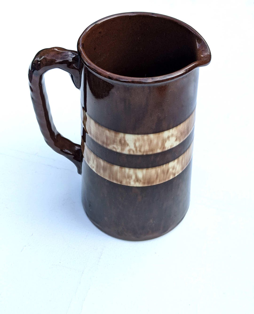 Vintage Brown Earthenware Jug With Mottled Stripes and Wavy Handle ...