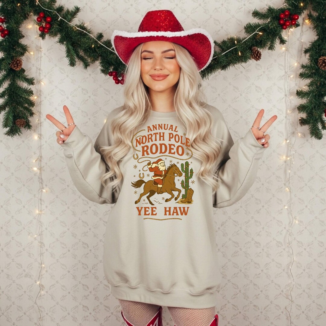 North Pole Rodeo Santa Riding Horse Sweatshirt | Yee Haw Christmas ...