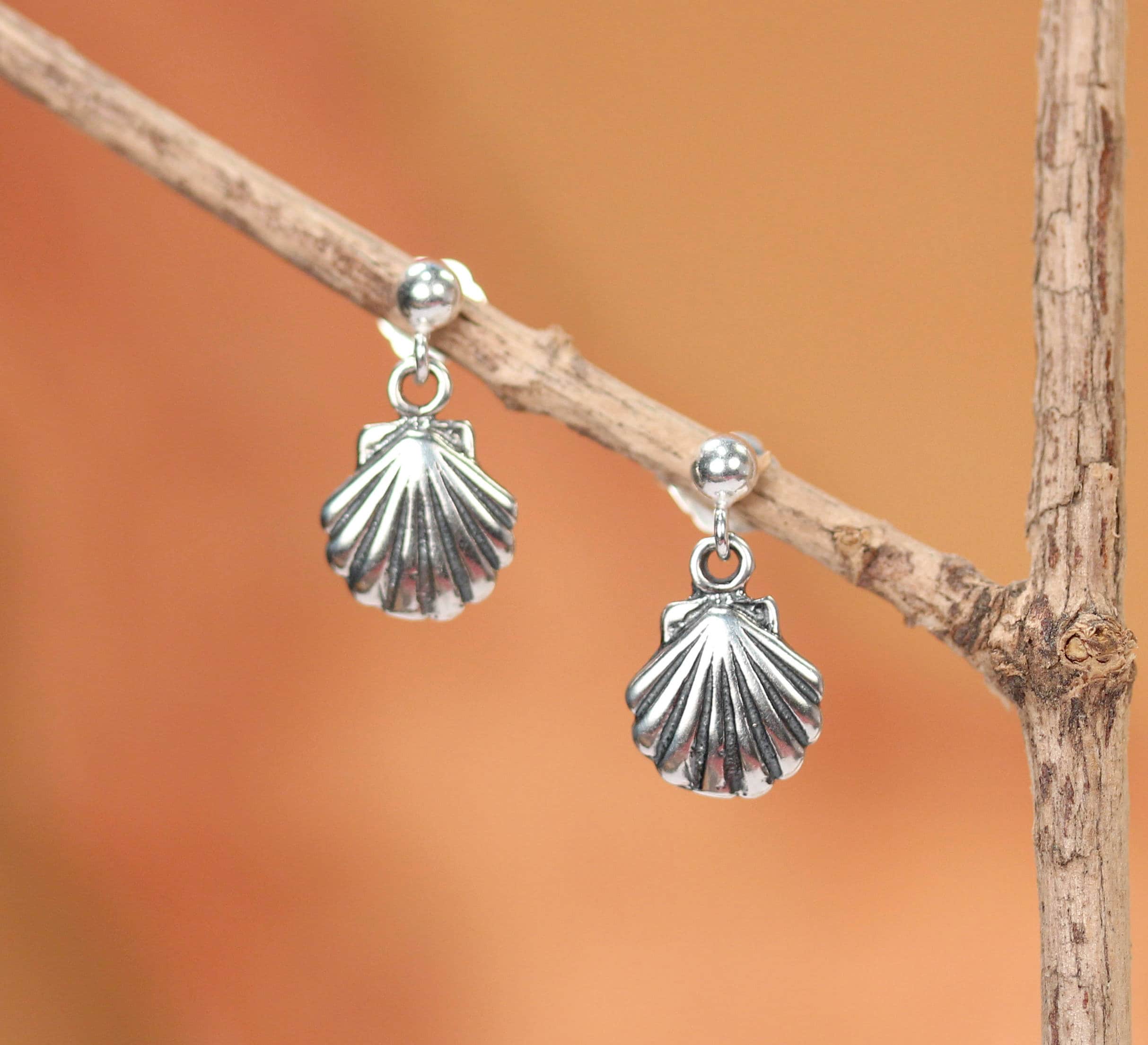 Tiny gold shell earrings, clam shell earrings, scallop earrings, gold ... Tiny gold shell earrings, clam shell earrings, scallop earrings, gold ...