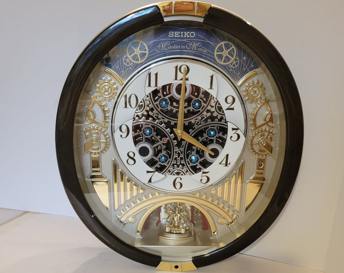 Seiko Melodies in Motion Swarovski Wall Clock QXM386BRH * Blue Face ...