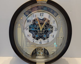 Seiko Melodies in Motion Wall Clock QXM109ZRH Beatles Songs Music Notes ...