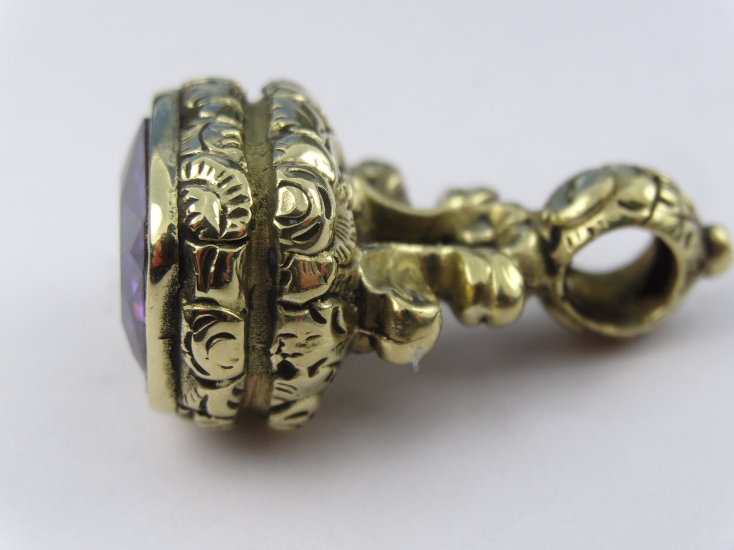 Gorgeous embossed fob seal charm pendant set with rich amethyst crystal