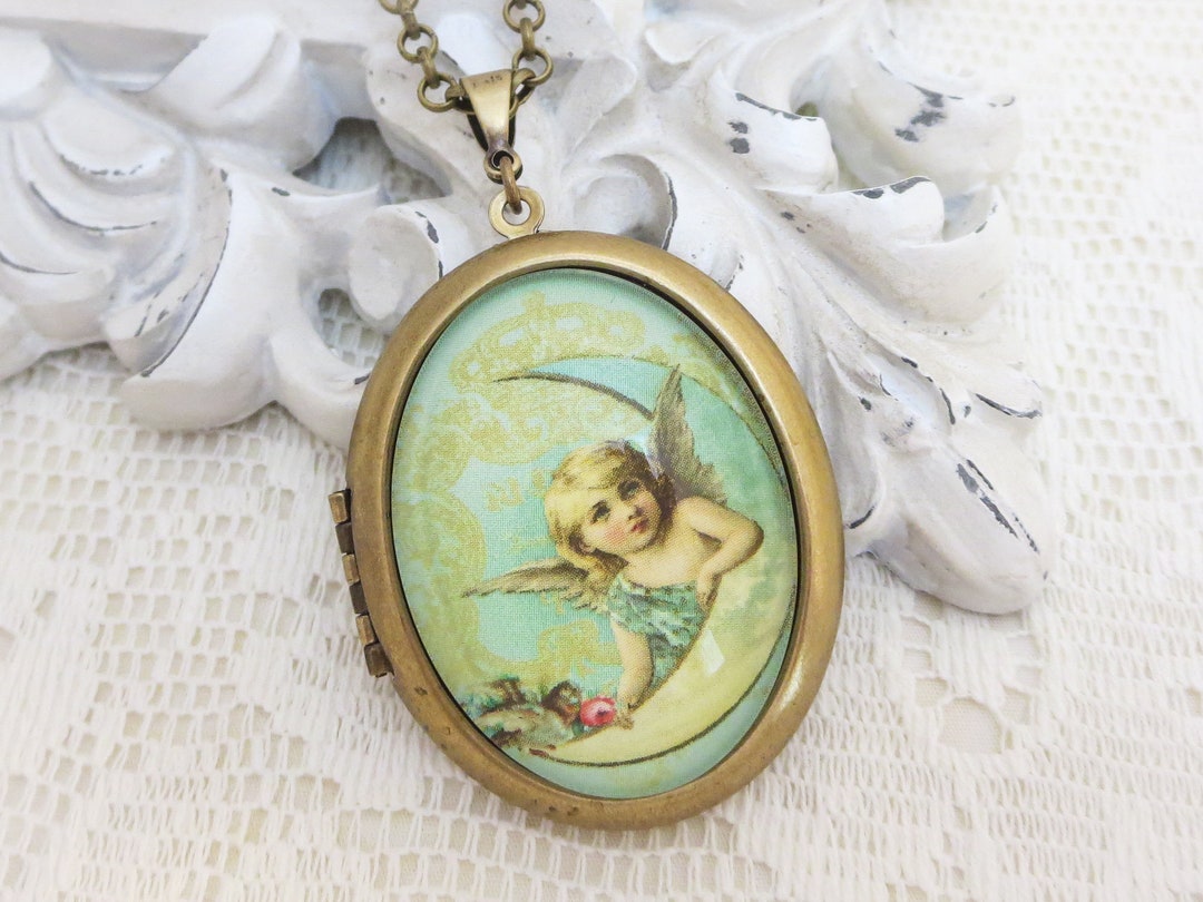 Angel Locket Angel on Moon Locket Art Glass Locket Large Oval Photo ...