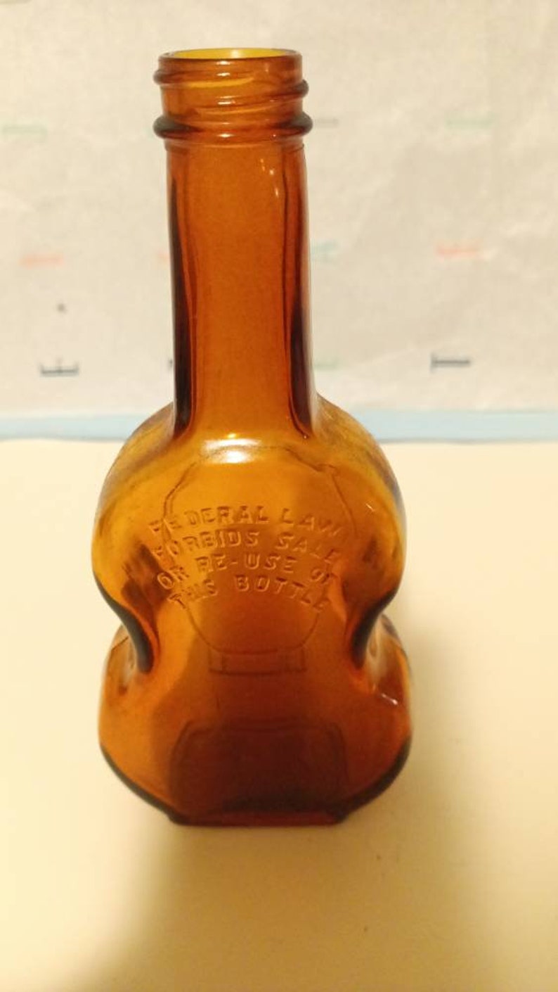 Antique/vintage (CELLO SHAPE) Amber Bottle DES. Pat. #107353 (marked ...