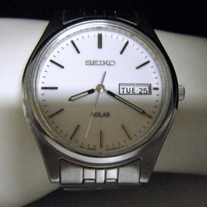 Seiko Solar Watch White Face Water Resistant Stainless Steel Works ...