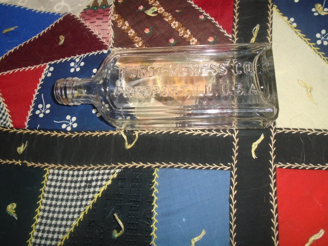 Antique Embossed Clear Glass Medicine Bottle Furst Mcness Co - Etsy