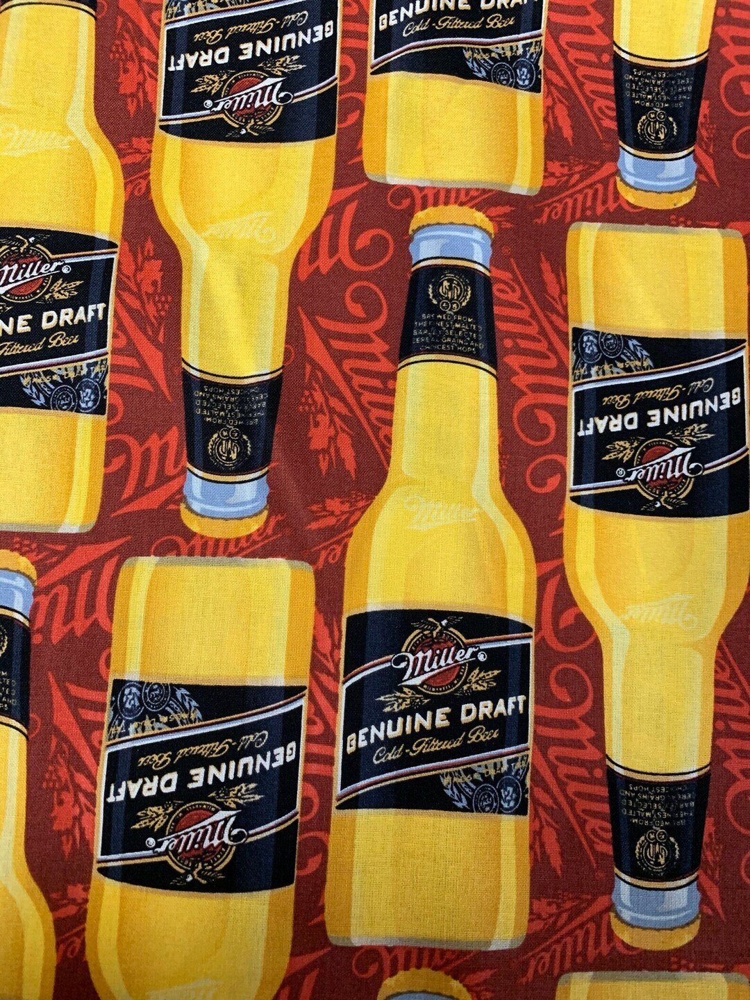 Miller Genuine Draft Beer Fabric: Gold Bottles on Red Fabric by the ...