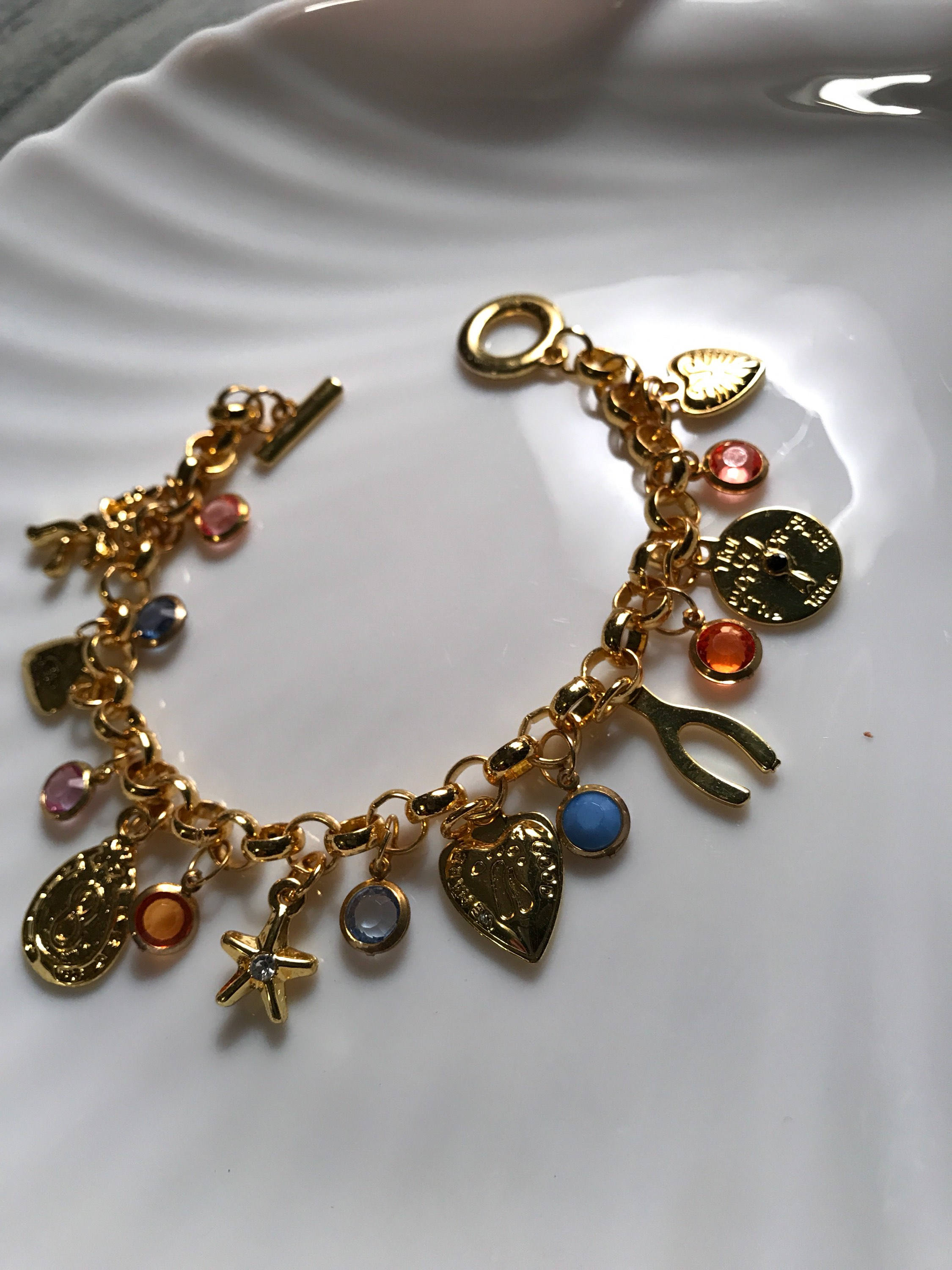 Pretty Goldtone Charm Bracelet with Love Good Luck Wish bone Hearts ...