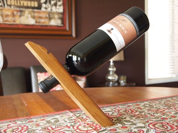 Wine barrel 'Balancing Act' wine bottle display and | Etsy