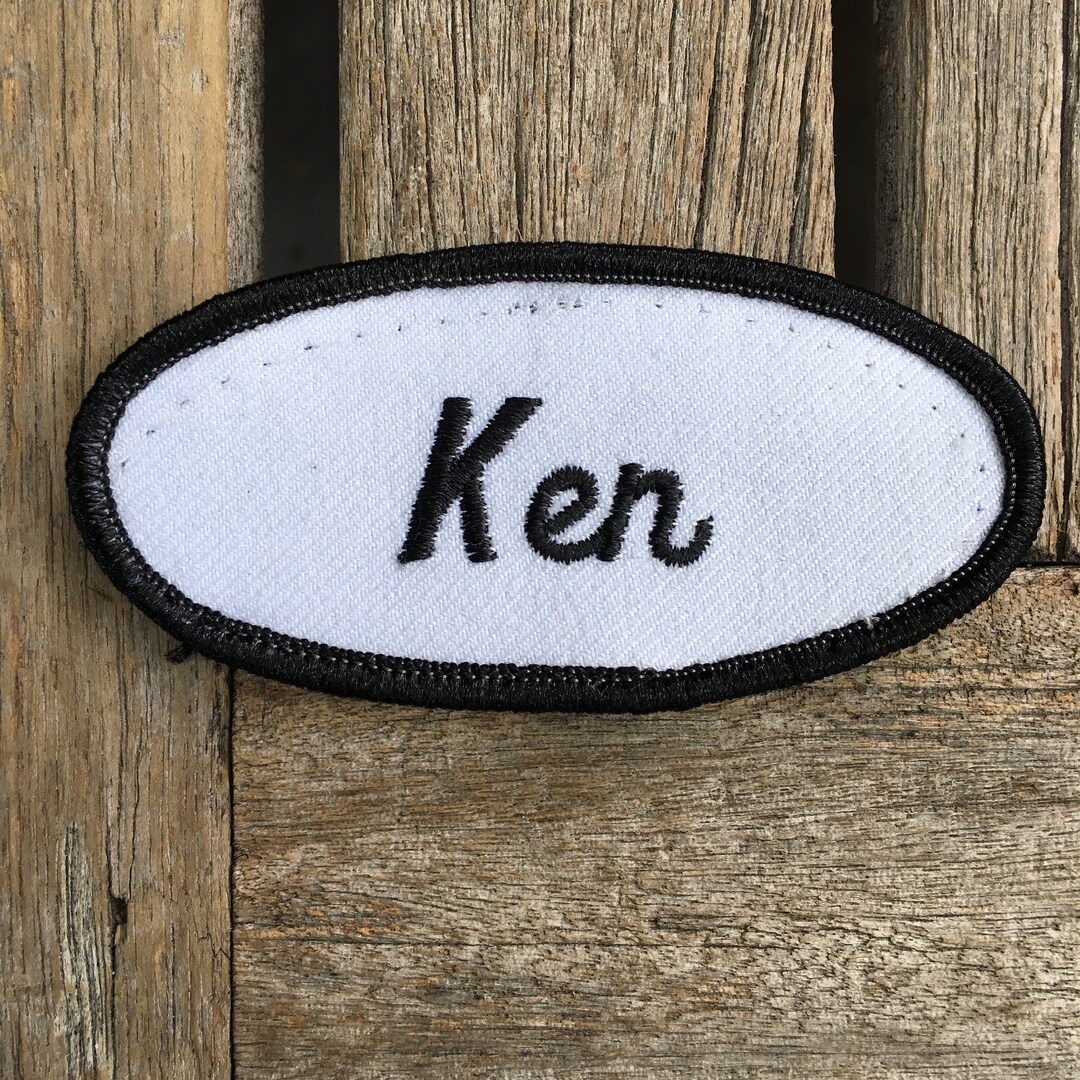 Ken, an off White Oval Work Shirt Name Patch That Says "ken" in Black ...