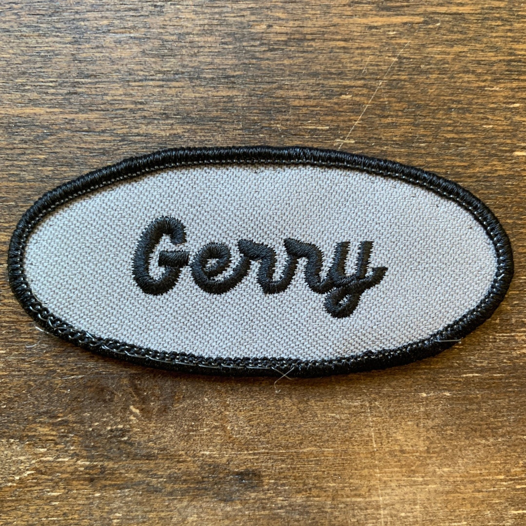 Gerry. A Gray Work Shirt Name Patch That Says "gerry" in Black Script ...