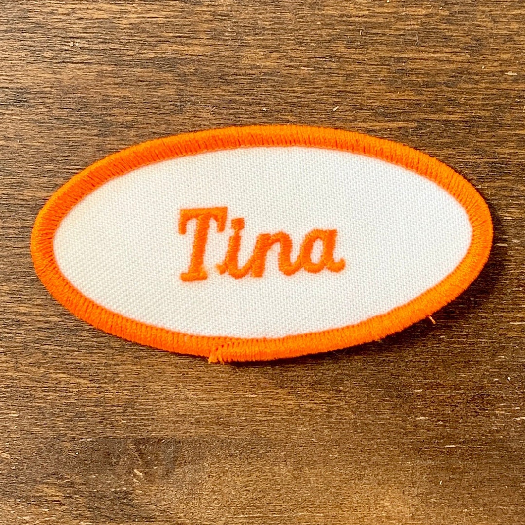 Tina. A White Work Shirt Name Patch That Says tina in Orange Script ...