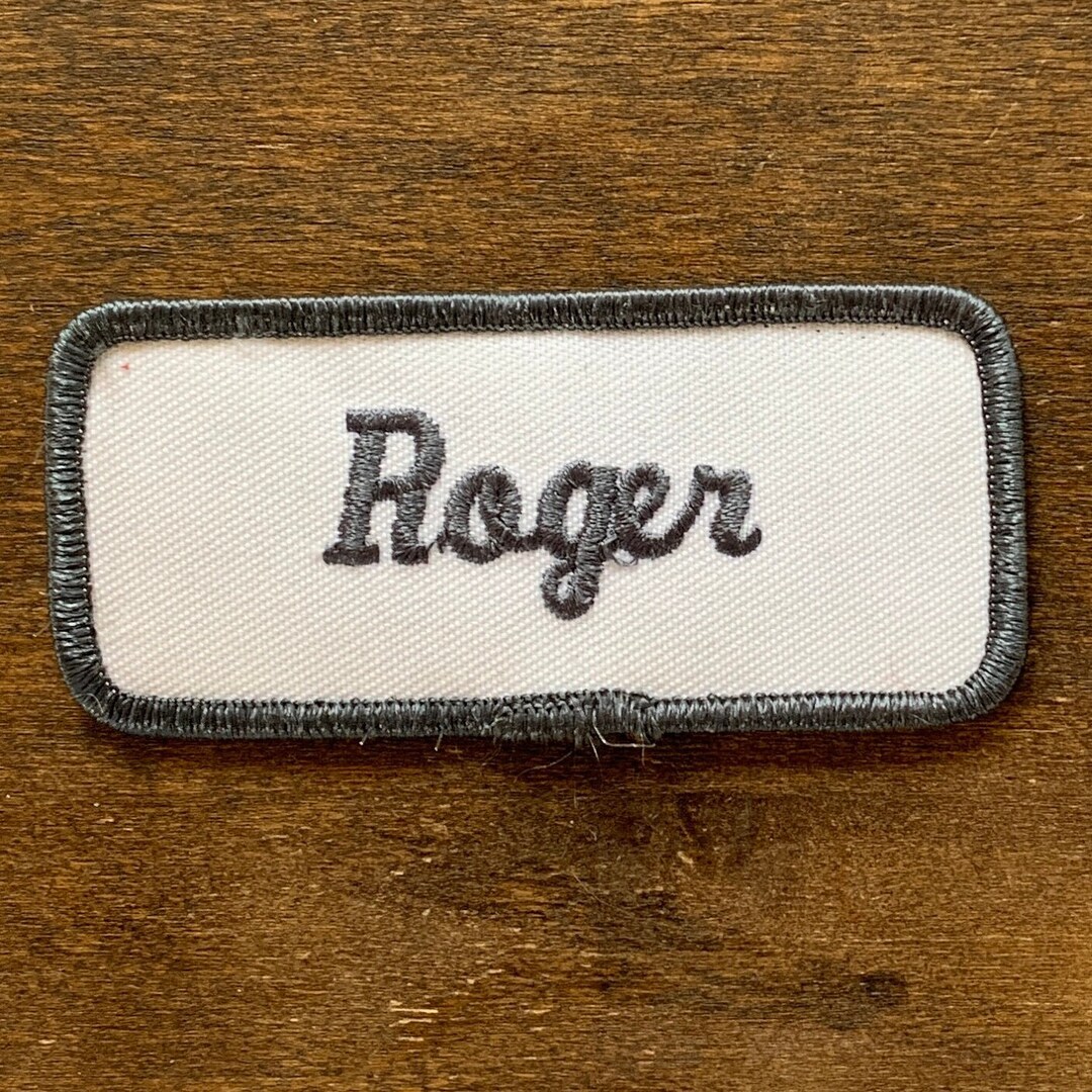 Roger. A White Work Shirt Name Patch That Says roger in Gray Script ...