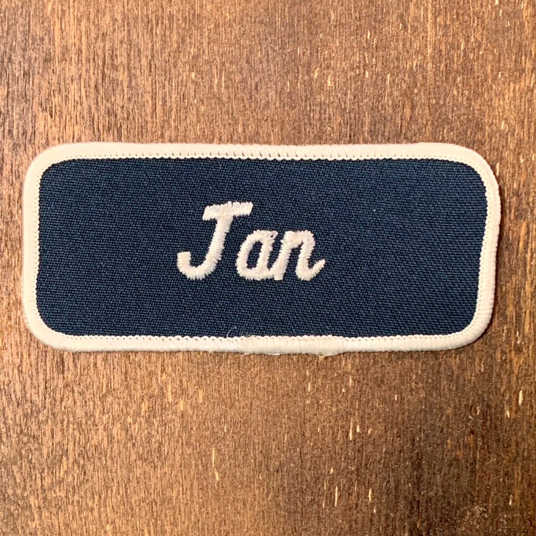 Jan. A Blue Work Shirt Patch That Says jan in White Script With White ...