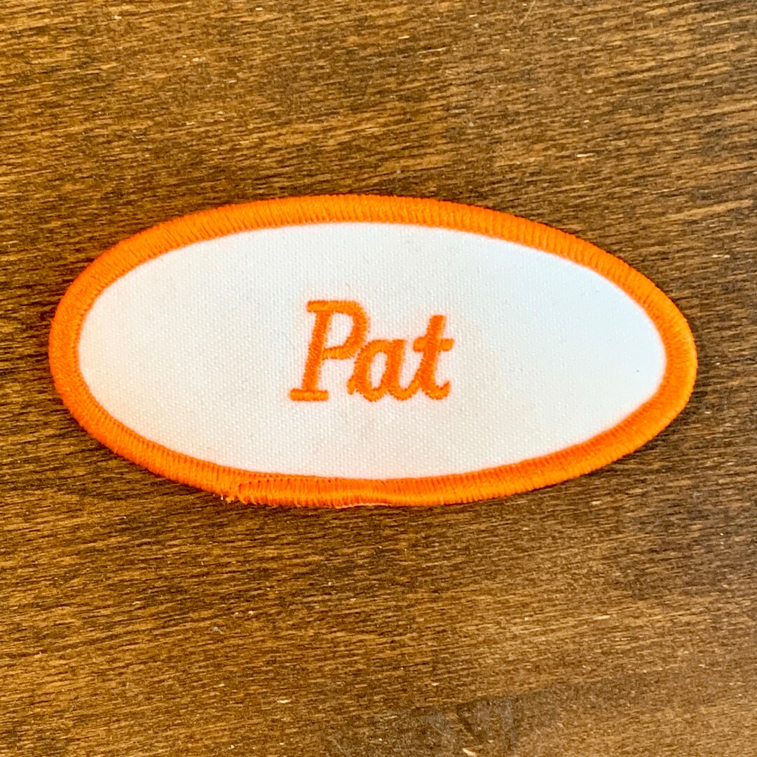 Pat. A White Oval Work Shirt Patch That Says pat in Orange Script With ...
