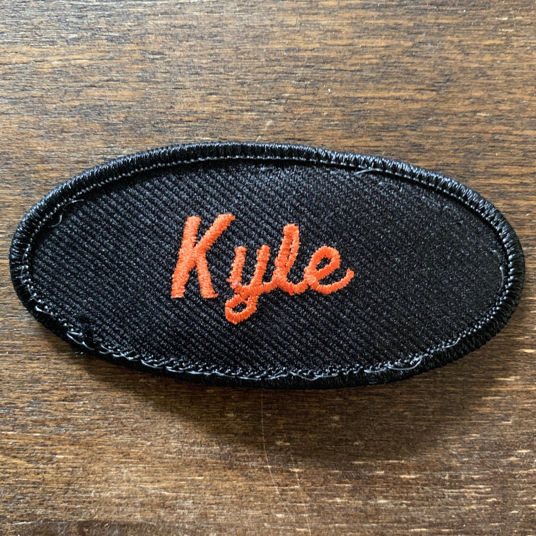 Kyle - A Black Work Shirt Name Patch That Says "kyle" in Orange Print With Black Border - Etsy