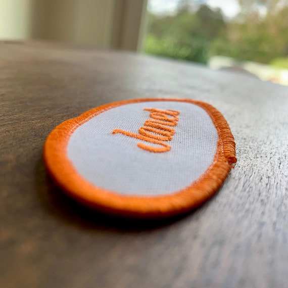 Janet. A white work shirt patch that says "Janet" in … - Gem