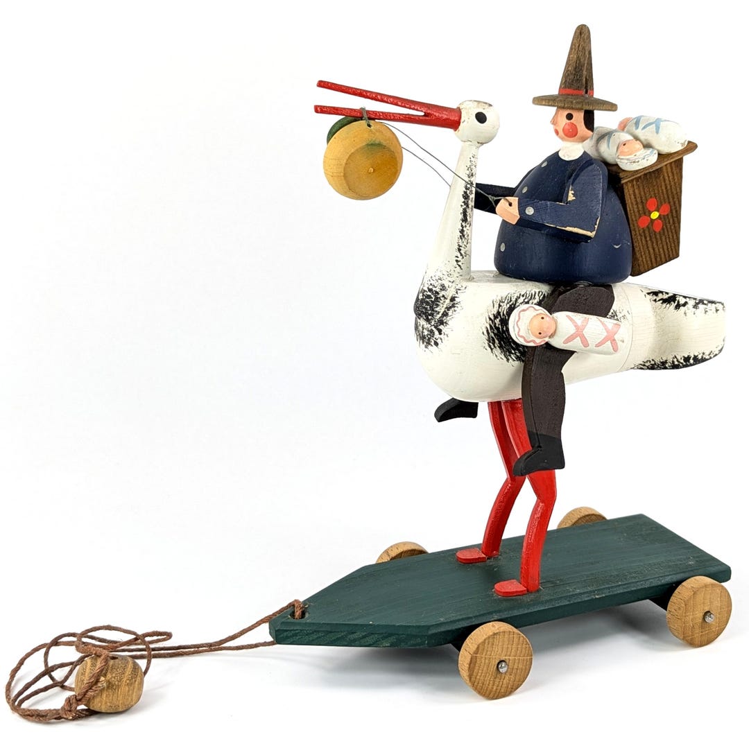 Stork Rider Bringing Babies Wooden Folk Art Toy on Wheels Container ...
