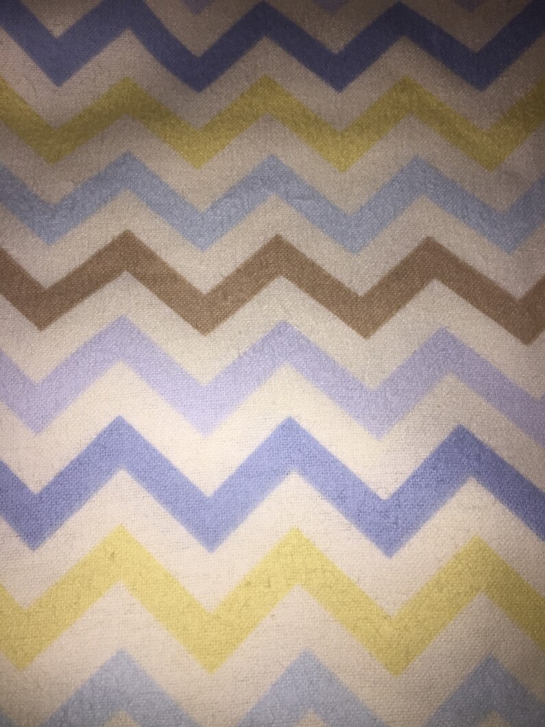 This Sheet is a Chevron Print in Blues and Tan on White Background ...