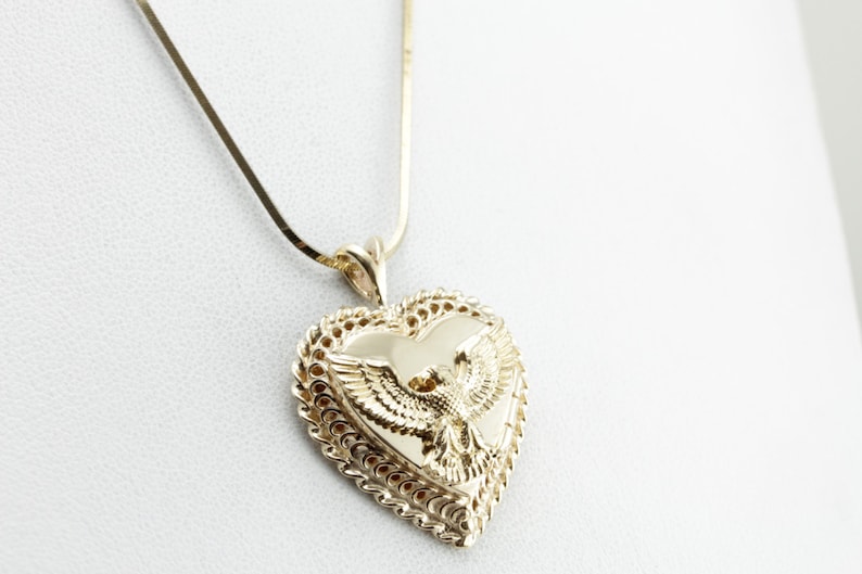 Patriotic Pride: Eagle Mounted Heart Shaped Locket, Polished Gold Bold ...