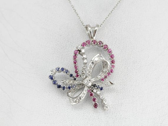 Retro Era Platinum Bow Pendant, Diamond, Ruby and Sap… - Gem