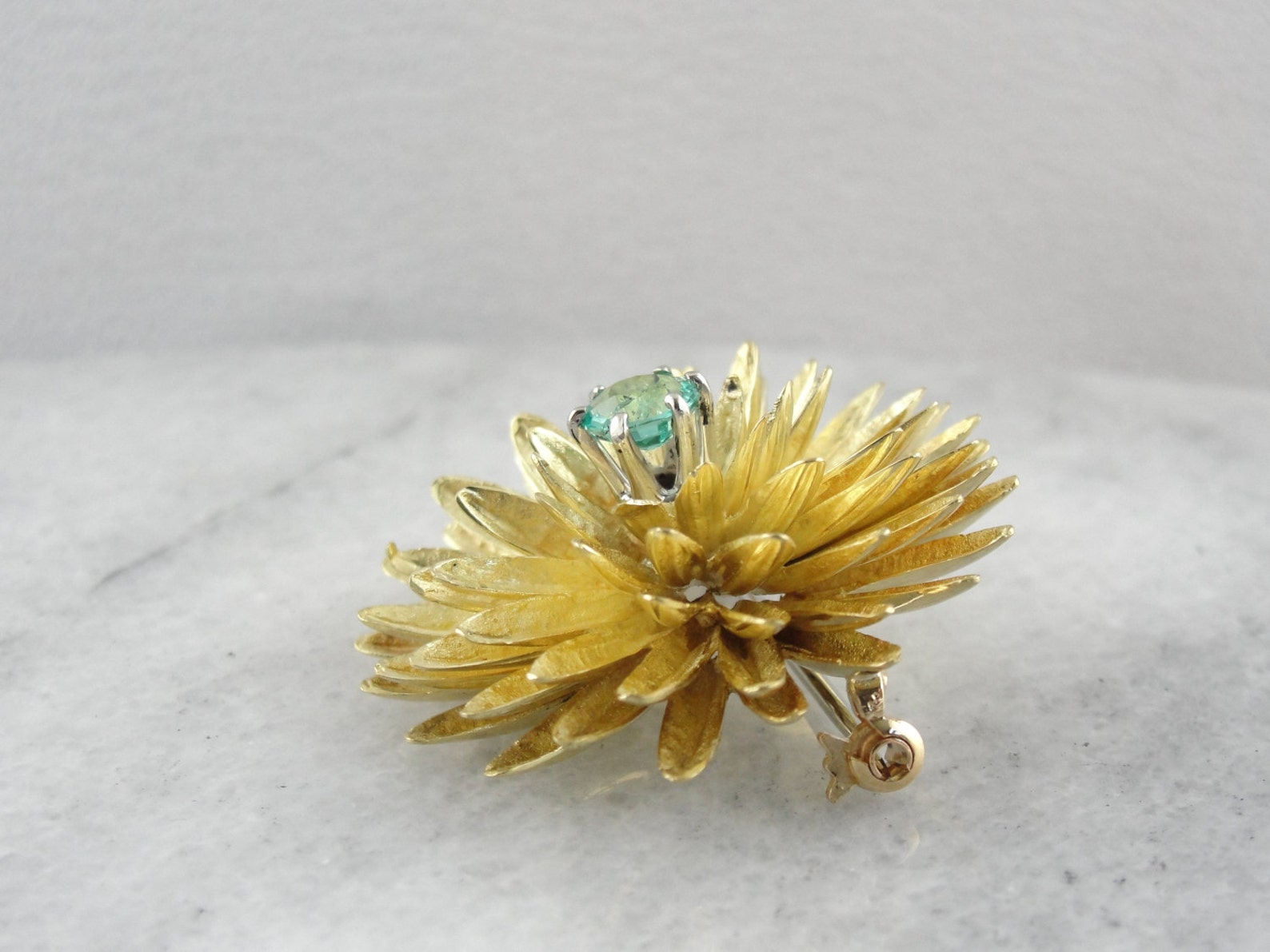 Flower Brooch With Bright Emerald Center, Textured High Karat Yellow ...