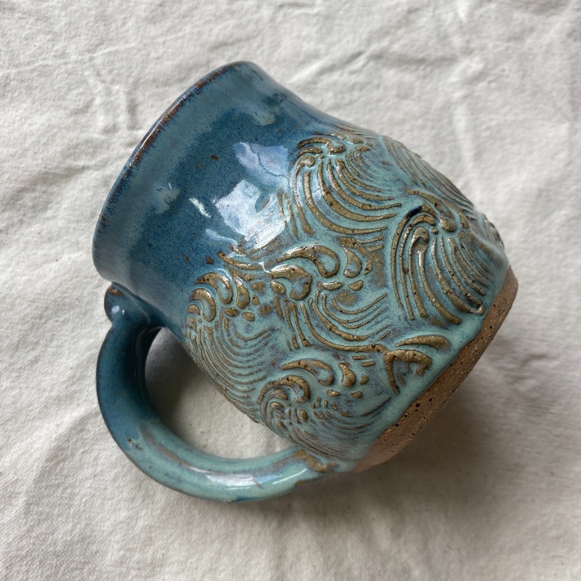 Handmade Pottery Mug: Textured Wave Design, Ocean Blue Rim - Etsy