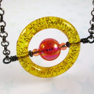 Saturn Spinner Pendant Necklace | Gold Orange Red Glitter | Long Chain ...