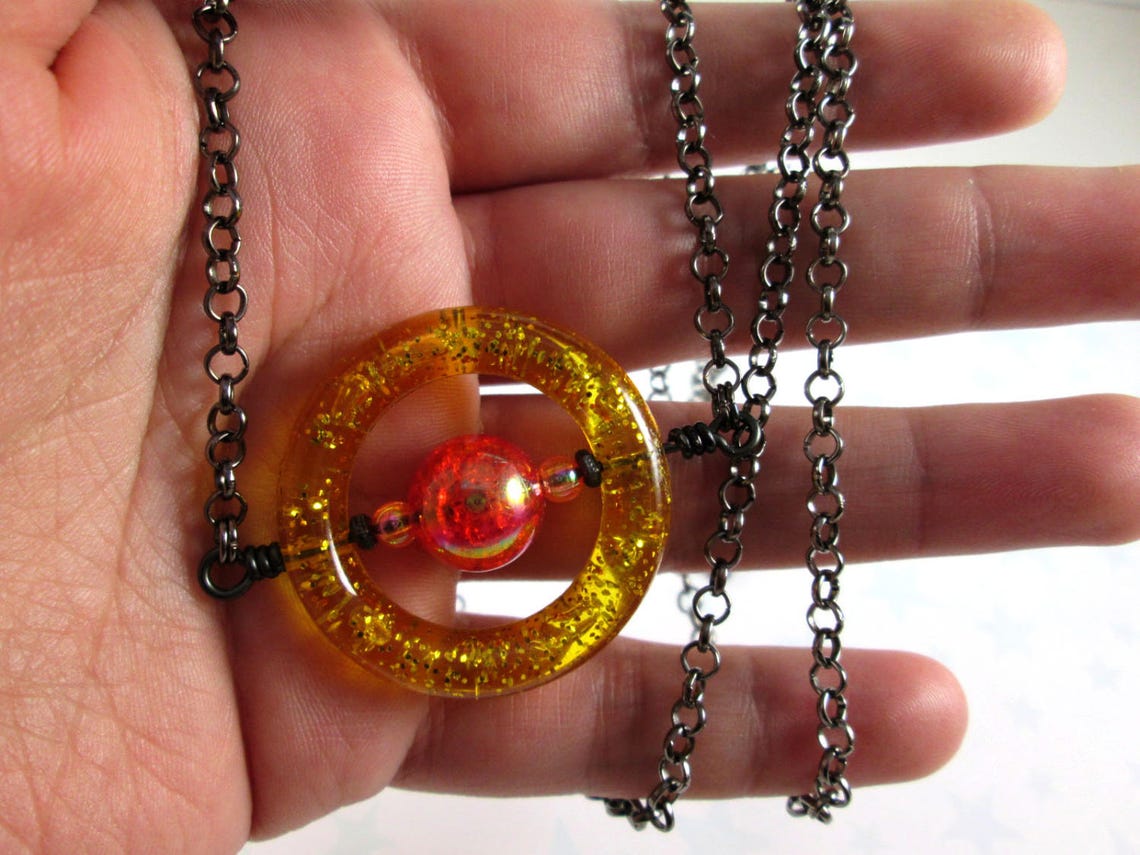 Saturn Spinner Pendant Necklace | Gold Orange Red Glitter | Long Chain ...