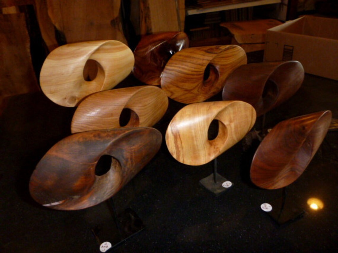 Large Mobius Strip. Oval Eye hand carved vertically mounted | Etsy