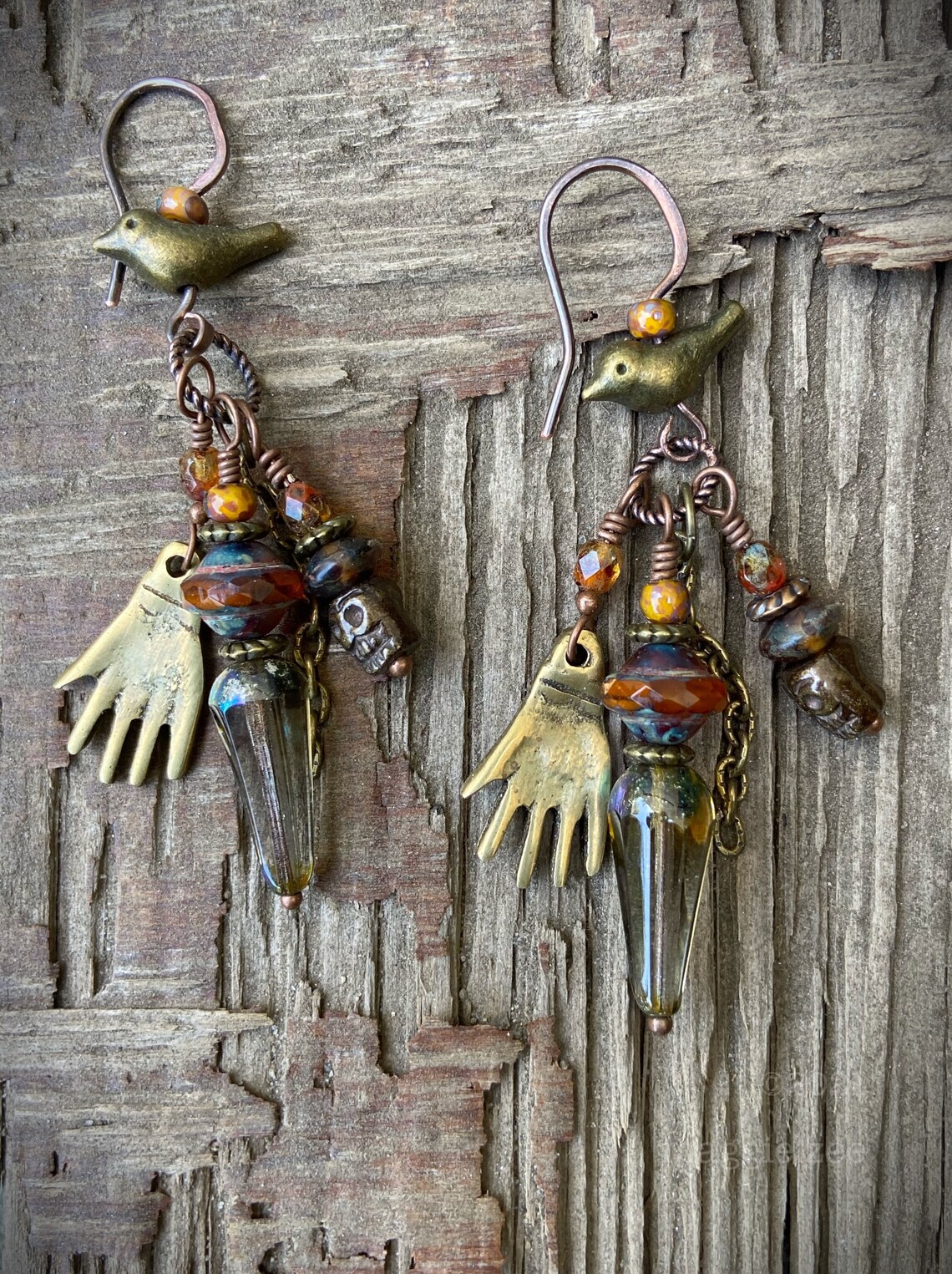 A Bird in the Hand Amulet Charm Earrings - Etsy