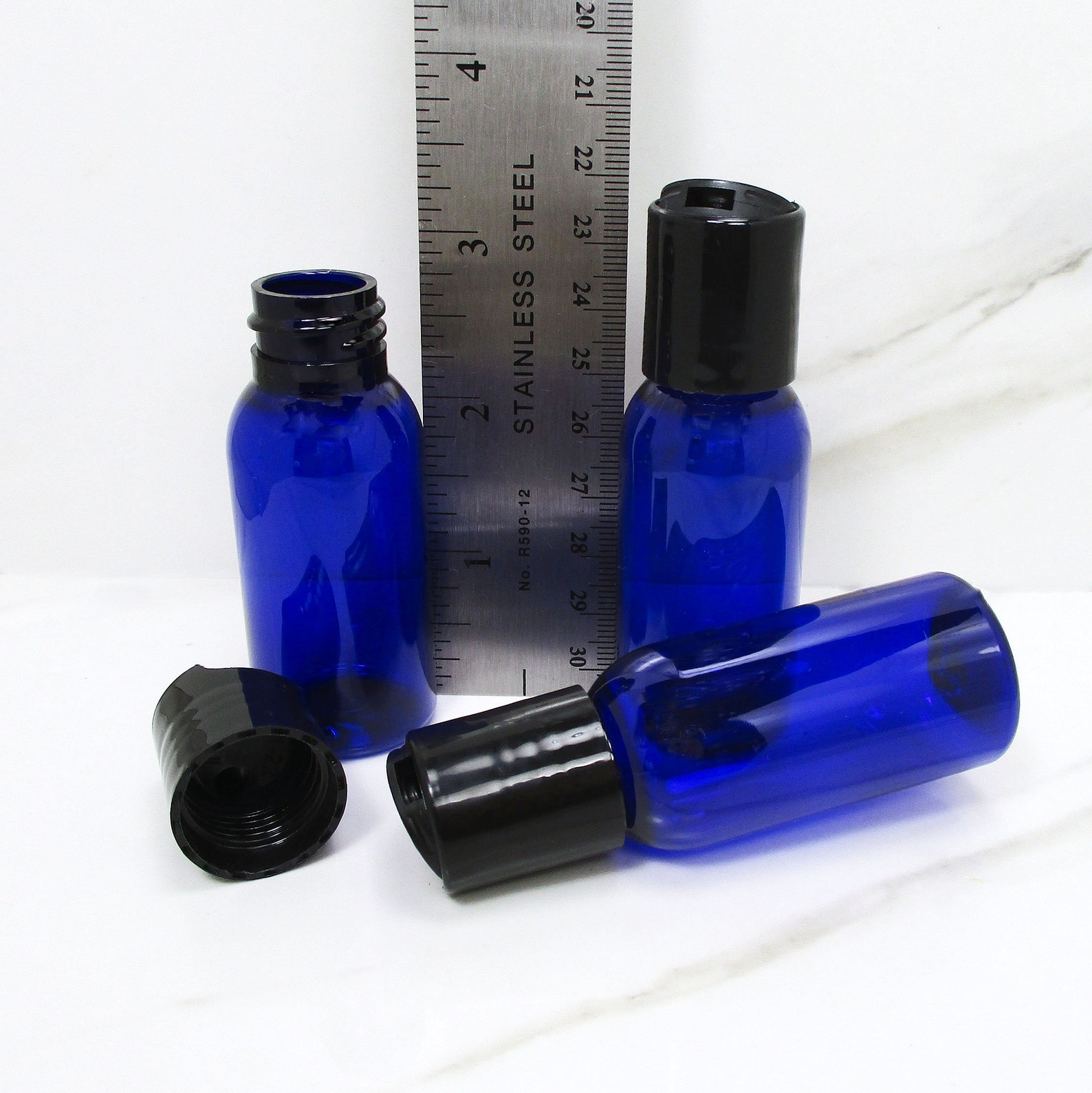 1 oz plastic bottles set of 5 blue Boston round empty bottles | Etsy