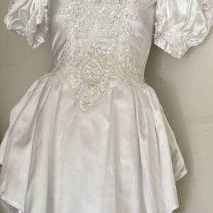 Elegant 80s Form Fitting Satin Wedding Gown With Peplum Style ...