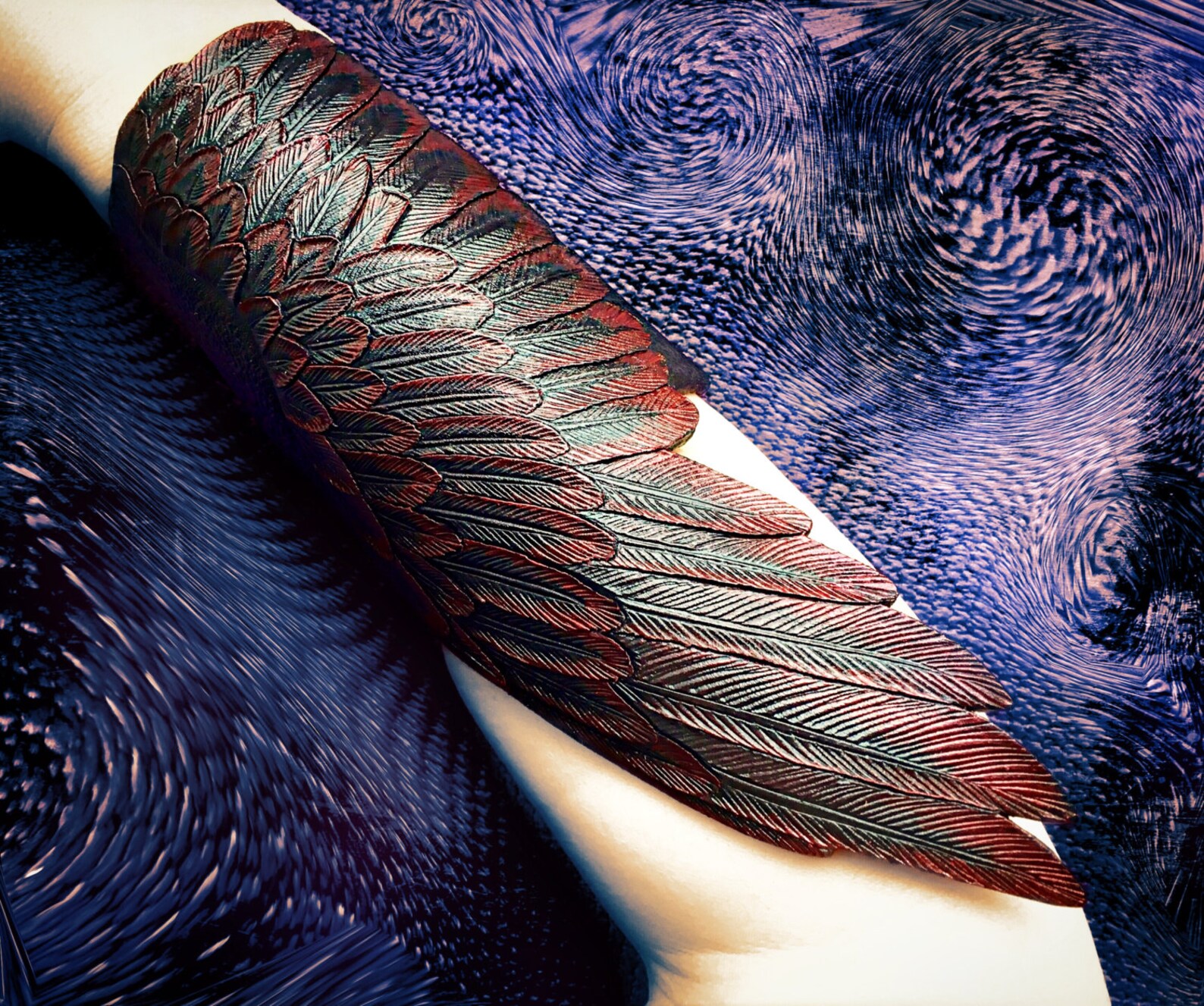 Tooled leather wing cuff with red iridescent sheen Tooled | Etsy