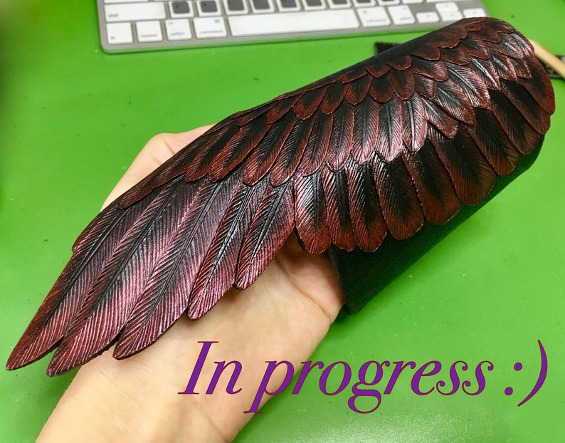Tooled leather wing cuff with red iridescent sheen Tooled | Etsy